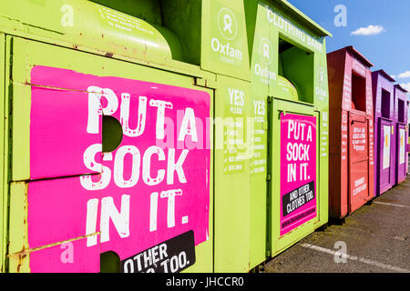 Charity recycling bins for clothing rags and shoes Stock Photo - Alamy