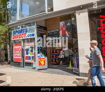 A logo sign outside of a Sports Direct International retail store in ...