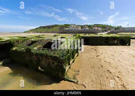 ARROMANCHES, FRANCE - JUNE 2014; Remains of the temporary harbor used ...