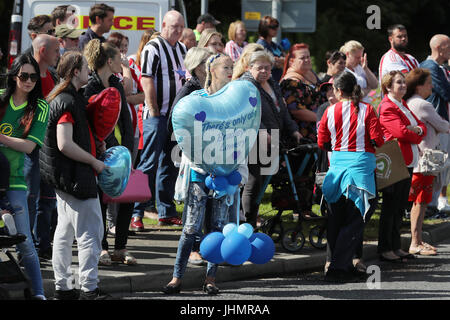 Mourners line the streets ahead of the funeral for 10-year-old Poppy ...