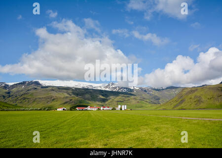 Eyjafjallajokull volcano in Iceland against blue summer sky with clouds ...
