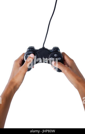 Womans hand playing video game against white background Stock Photo - Alamy