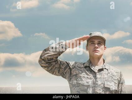 Digital composite of Soldier man raising arm against green background ...