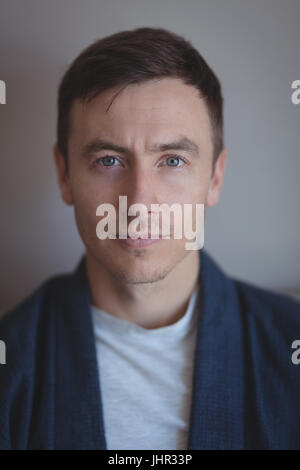 Portrait of man standing Stock Photo - Alamy