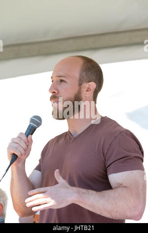 Seattle Mayor Mike McGinn speaks during the reopening of the main ...