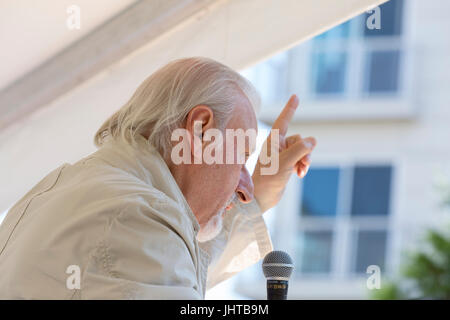 Seattle, Washington: Alex Tsimerman speaks at a forum during West Stock ...