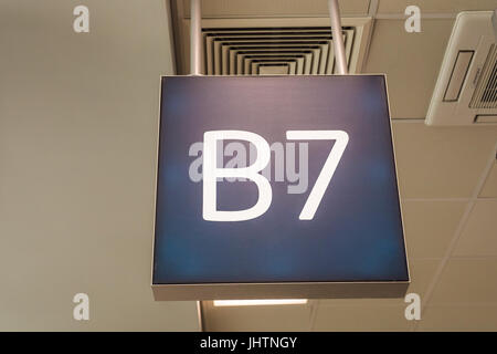 Airport Boarding gate entrance number sign board in departure area ...