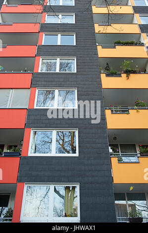 A low-angle view of a contemporary building facade featuring large ...