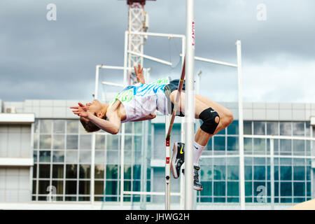 high jump male athlete successful attempt at competition Stock Photo ...