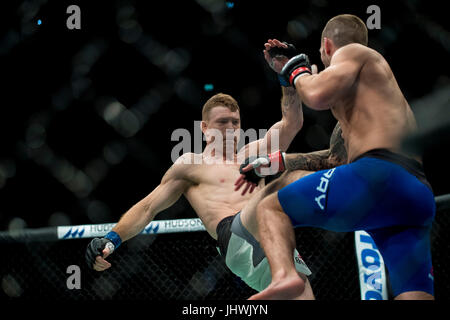 Paul Felder (White shorts) defeats Stevie Ray in their lightweight bout ...