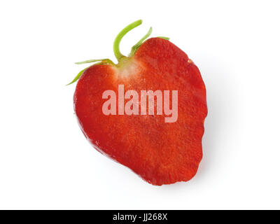Close up of one cut strawberry on a pile of fresh ripe strawberries ...