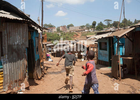 kids playing in kibera slum, the largest one in africa - nairobi, kenya ...