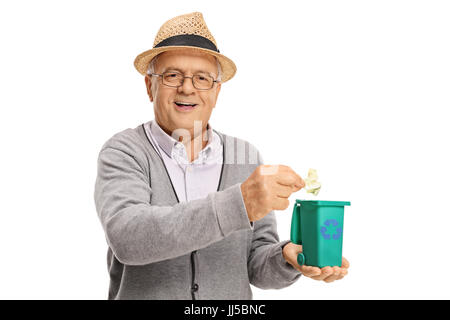 Person throwing piece of trash into garbage can Stock Photo: 5421676 ...