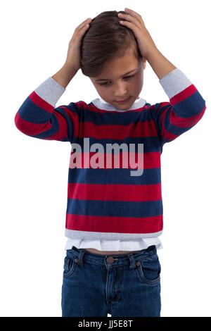 Headache. Boy touching head and have a migraine. Angry little boys with ...