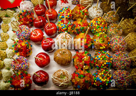 Assorted colorful toffee apples Stock Photo - Alamy
