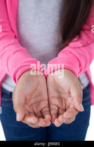 Mid section of girl pretending to be holding invisible object Stock ...