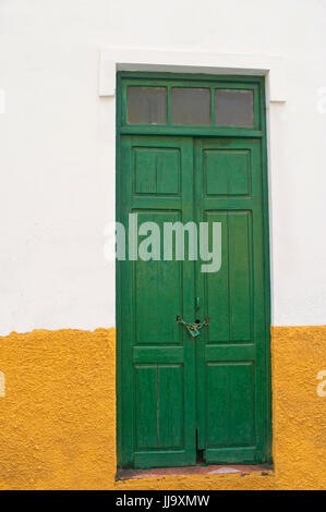 old house with green door in old street of Jakarta, Indonesia Stock ...