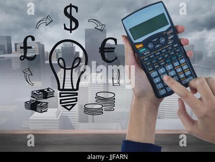 Cropped hands using calculator and writing in notebook for tax ...