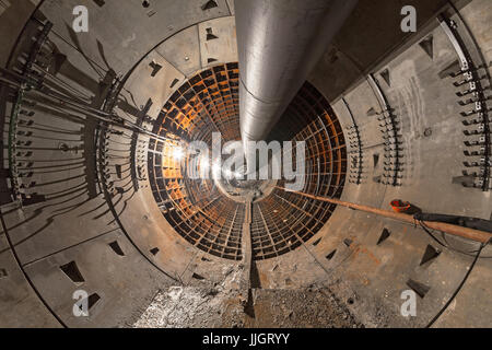 Empty subway tunnel under construction. Large temporary ventilation ...