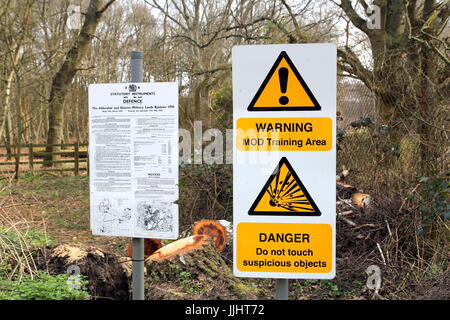 Warning sign indicating MOD Ministry of Defence training area, and ...