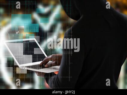 Mid section of male hacker using laptop against dark room Stock Photo ...