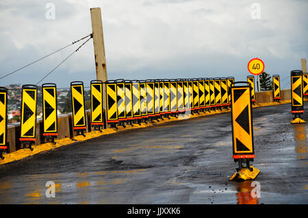 yellow and black reflective warning road sign with right arrow and ...