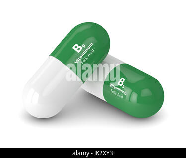 3d render of B9 folic acid pill with granules isolated over white ...
