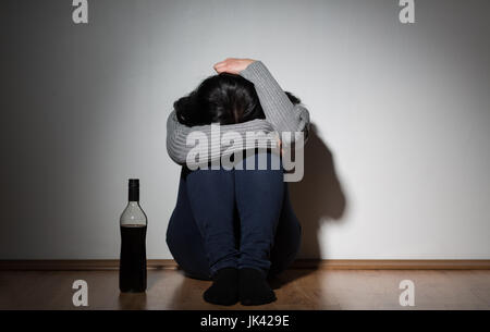 depression - crying sad woman drinking wine and smoking isolated on ...