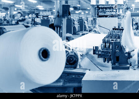 Detail of string reels in factory,blue tone map Stock Photo - Alamy