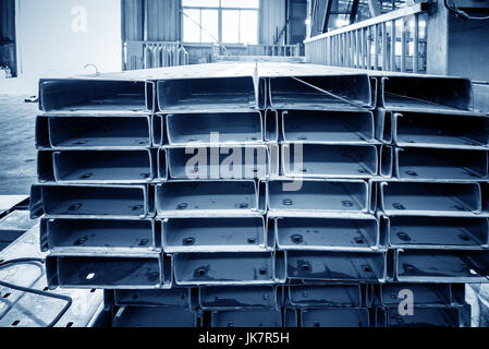 Steel factory floor, stacked with a lot of steel Stock Photo - Alamy