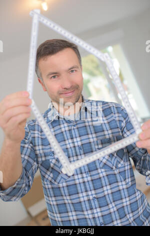 House shaped ruler Stock Photo - Alamy