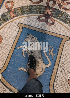 Spinning on the mosaic of the bull at Galleria Vittorio Emanuele in ...