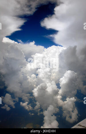Fluffy cumulus clouds float over the new seawall at Lytham St Annes ...