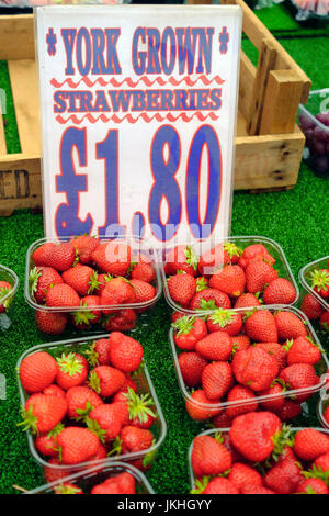 Ripe Strawberries on display on a greengrocer's stall in autumn in ...