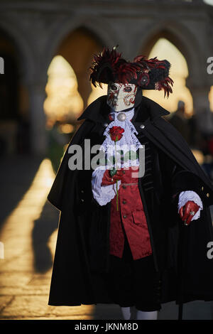 Bauta Mask and hat with red feathersin Carnival of Venice Stock Photo ...