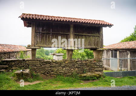 traditional white stone pillars farm field entrances on a farm in rural ...