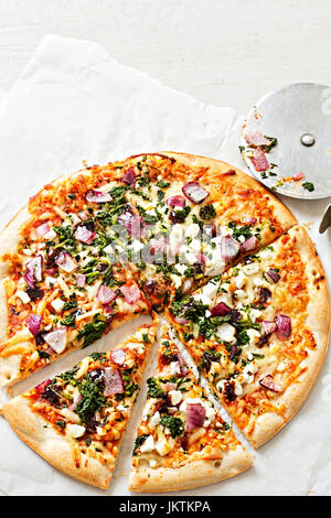 Hot delicious homemade American pizza with red pepper and meat with a ...