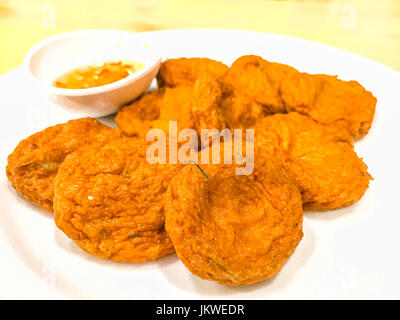 Tod Mun Pla Krai, Thai Deep Fried curried clown knifefish cake with ...