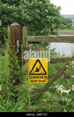 Danger Soft Mud warning sign on the beach Stock Photo - Alamy