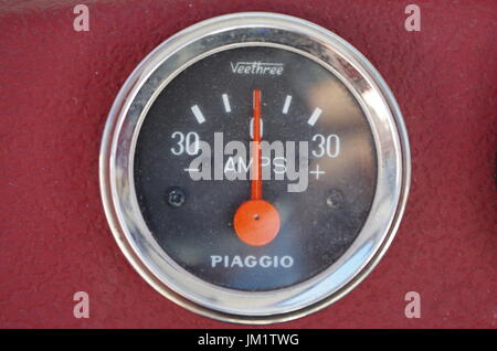 Piaggio analogue Tuk-tuk amps dial. Motors and parts Stock Photo - Alamy