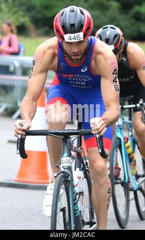 Adam Bowden Team GB elite triathlete stretching before the swimming ...