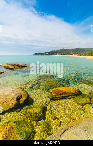 Rocks and golden sand in Solanas beach. Sardinia, Italy Stock Photo - Alamy