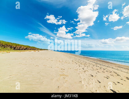 Clouds over Perdepera beach Stock Photo - Alamy