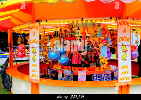 Toys on display as prizes at Hook-a-duck / Duck Pond Game, traditional ...