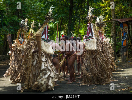 Rom dance masks and giant slit drum during a ceremony, Ambrym island ...