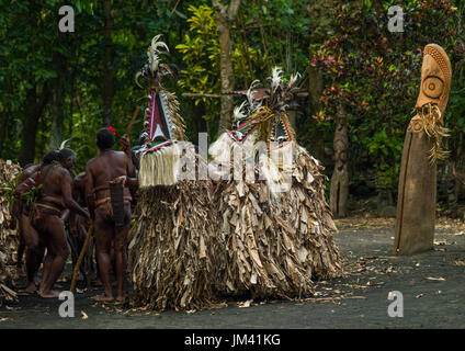 Rom dance masks and giant slit drum during a ceremony, Ambrym island ...