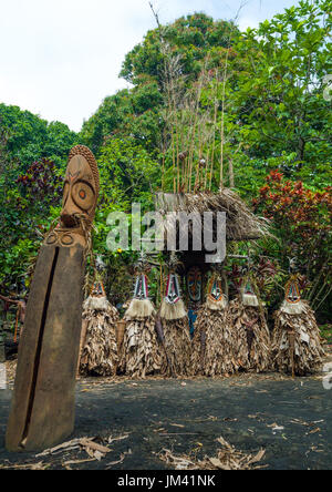 Rom dance masks and giant slit drum during a ceremony, Ambrym island ...
