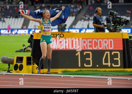 Isis Holt celebrating after winning the 100m T35 in record time in the ...