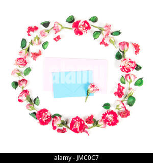 Composition of rose wreath on blue background Stock Photo - Alamy