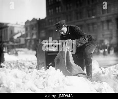 Man collecting mail from mailbox Stock Photo - Alamy